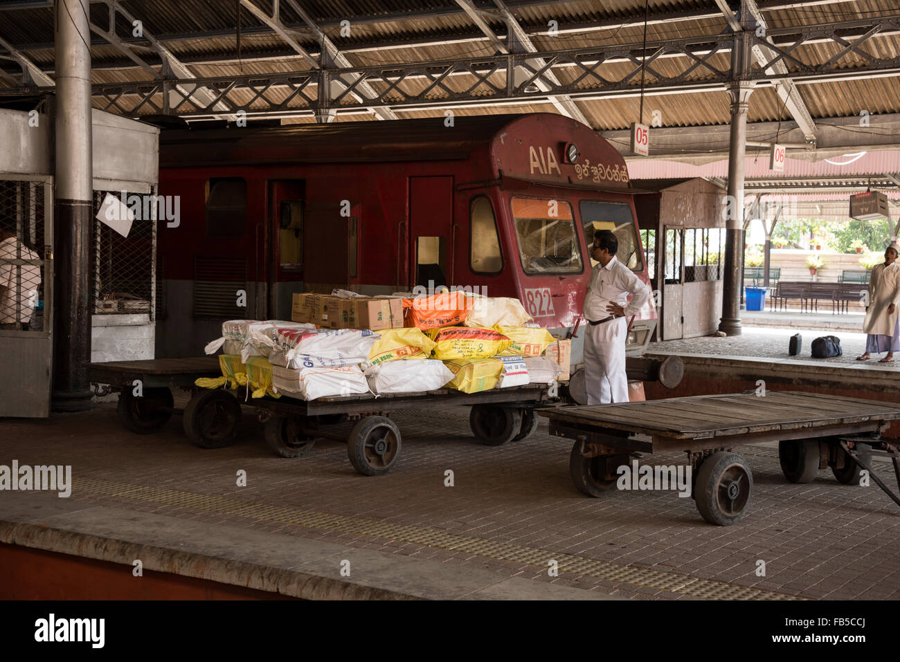 Goods waiting to be loaded onto a passenger train at Colombo Fort ...