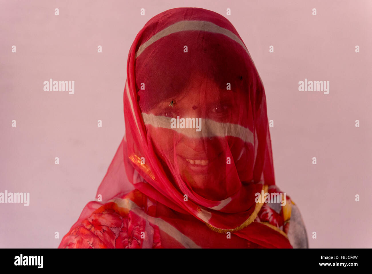 Lady With Red Veil Stock Photo - Alamy
