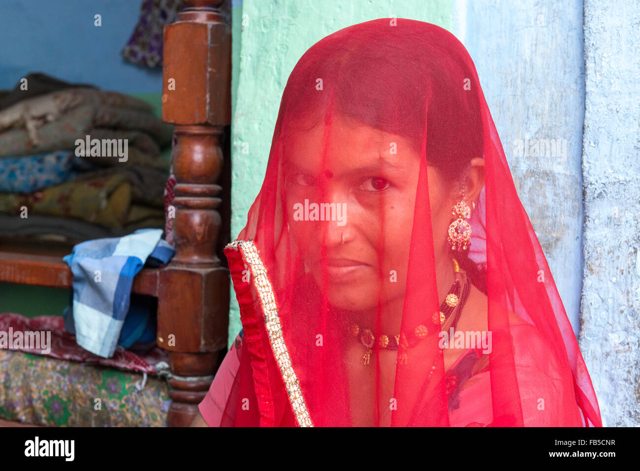 Lady With Red Veil Stock Photo - Alamy