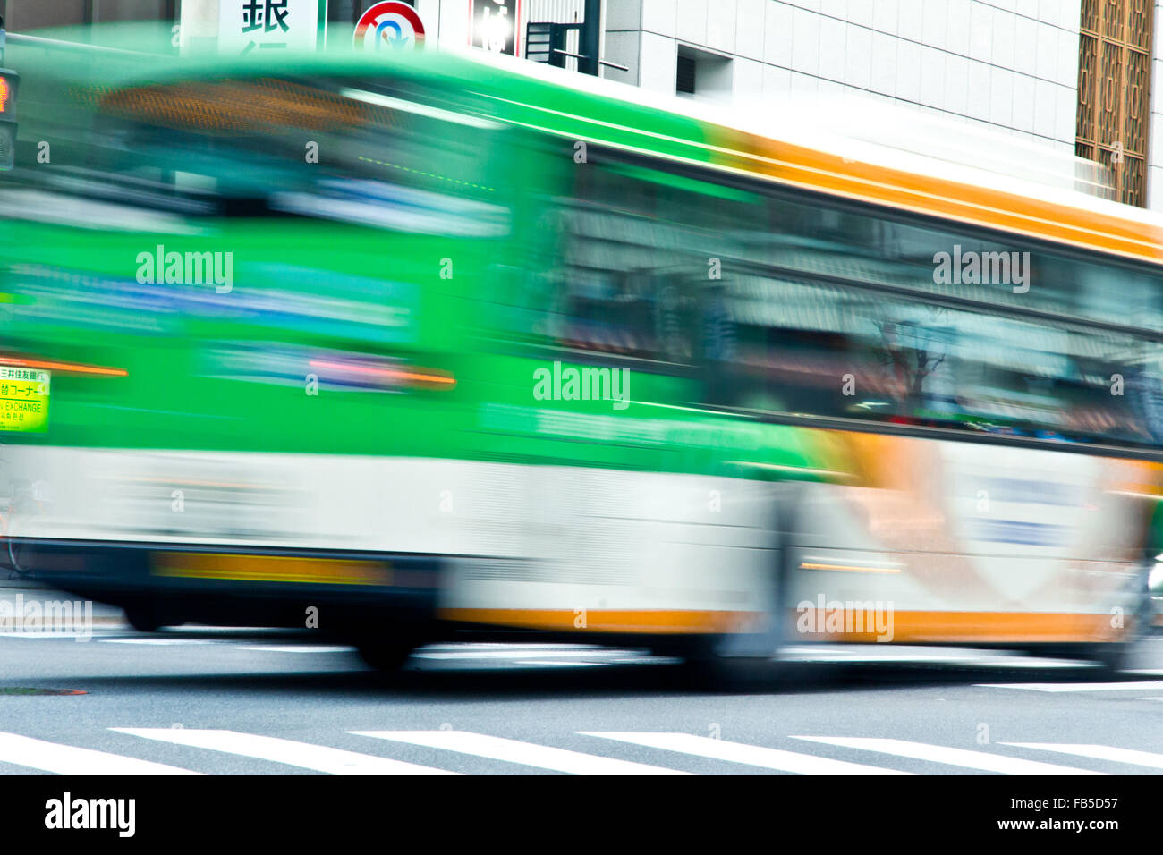 Bus Speeding in motion tokyo, japan Stock Photo - Alamy