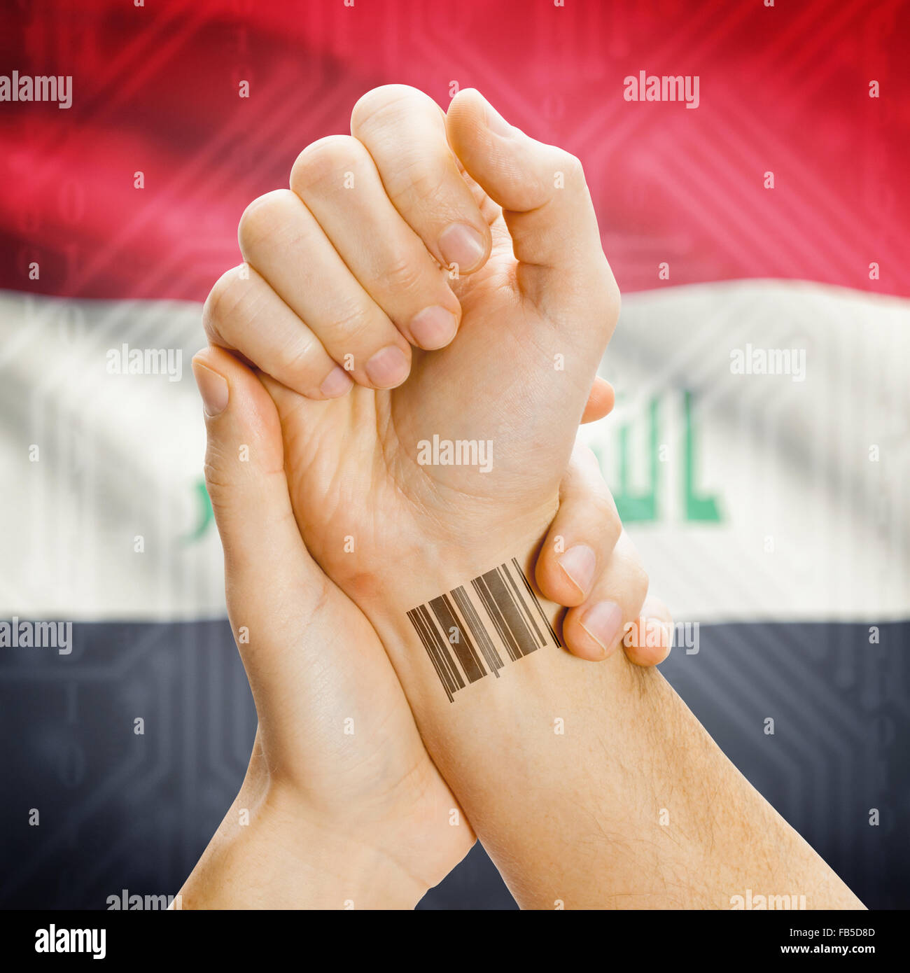 Barcode ID number on wrist of a human and national flag on background ...