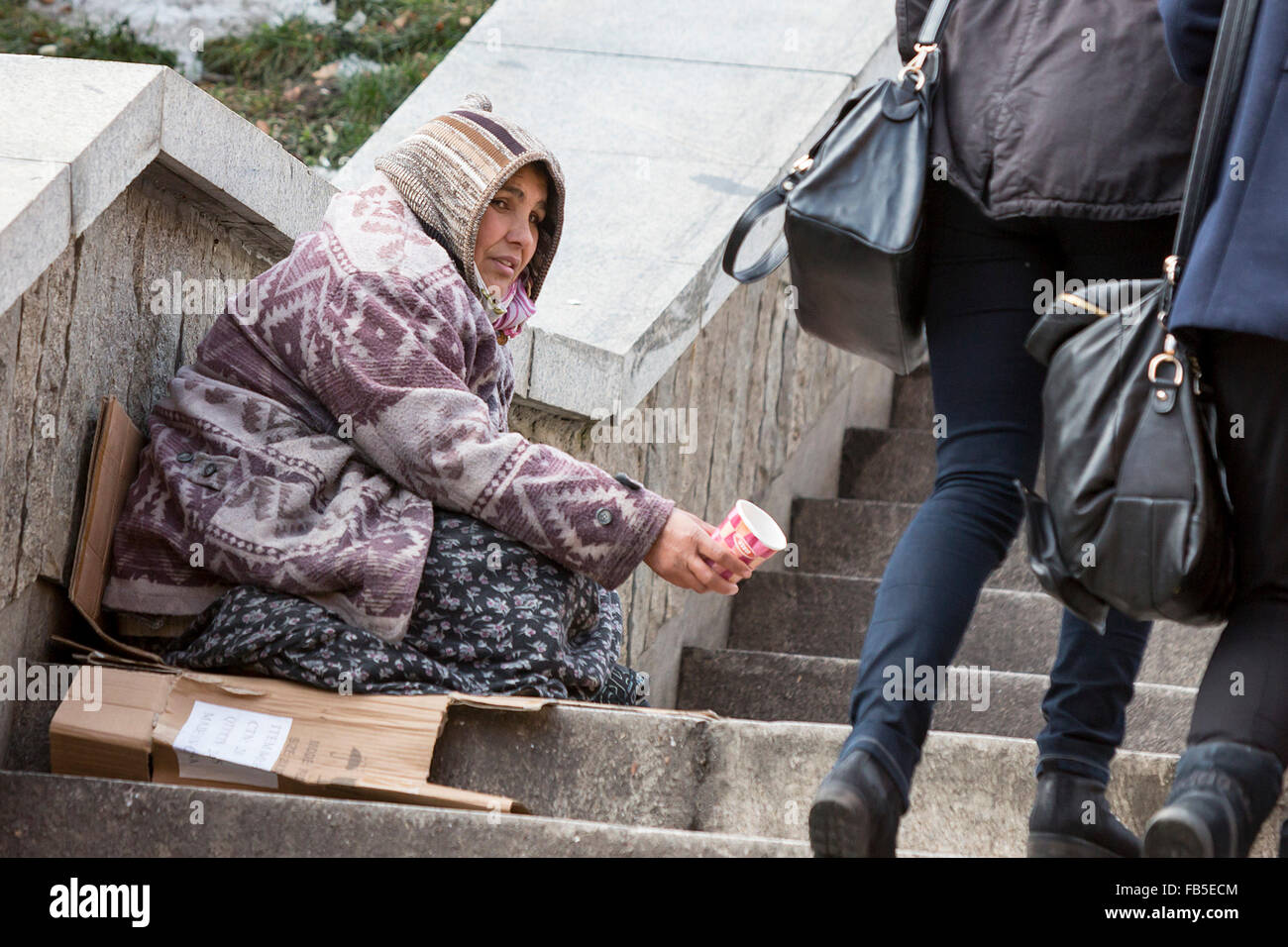 Sofia, Bulgaria - January 8, 2016: A homeless gypsy woman is begging ...