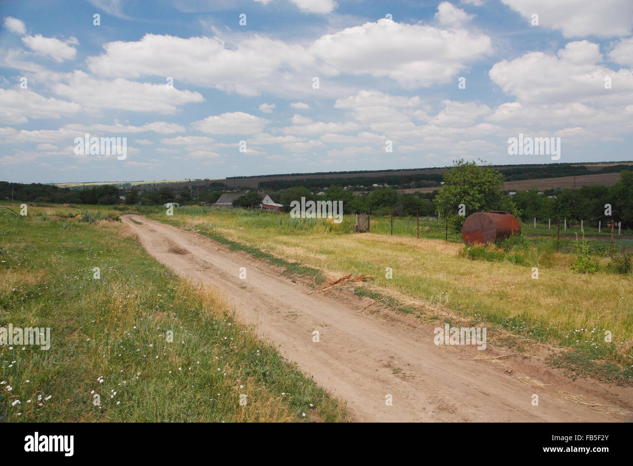 Rural landscape, rural road on the background of the cloudy sky Stock ...