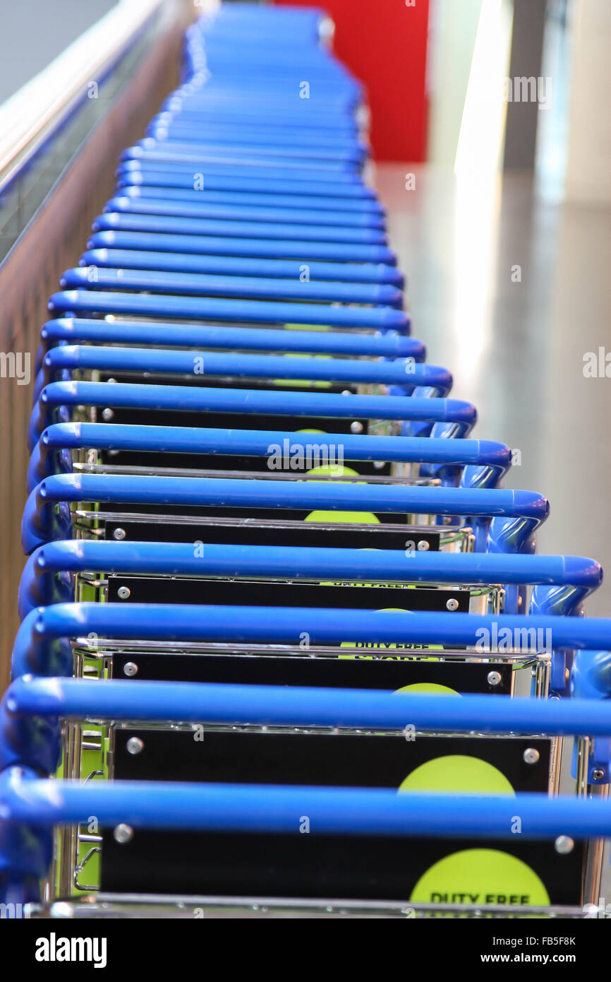 Duty-free cart line Stock Photo - Alamy