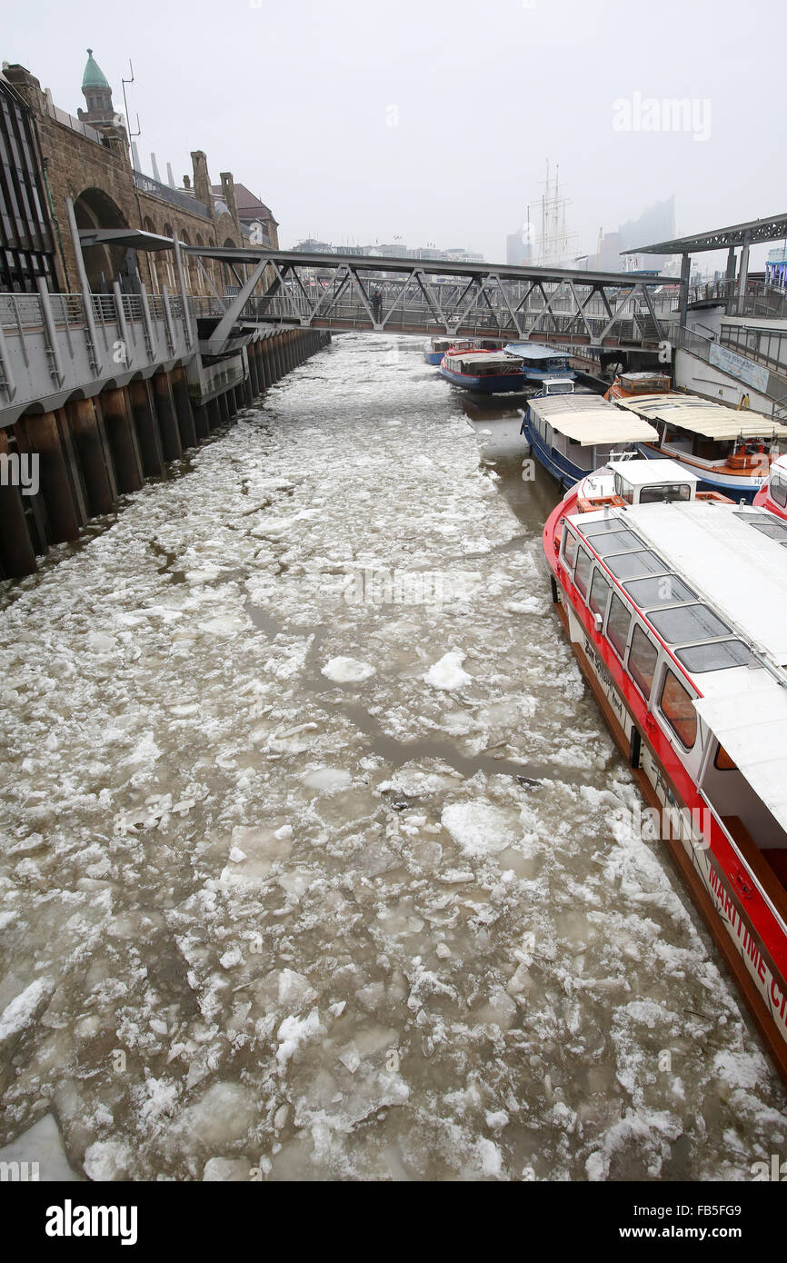 Hamburg, Germany. 10th Jan, 2016. Ice floating on the surface of the Elbe river during rainy ...