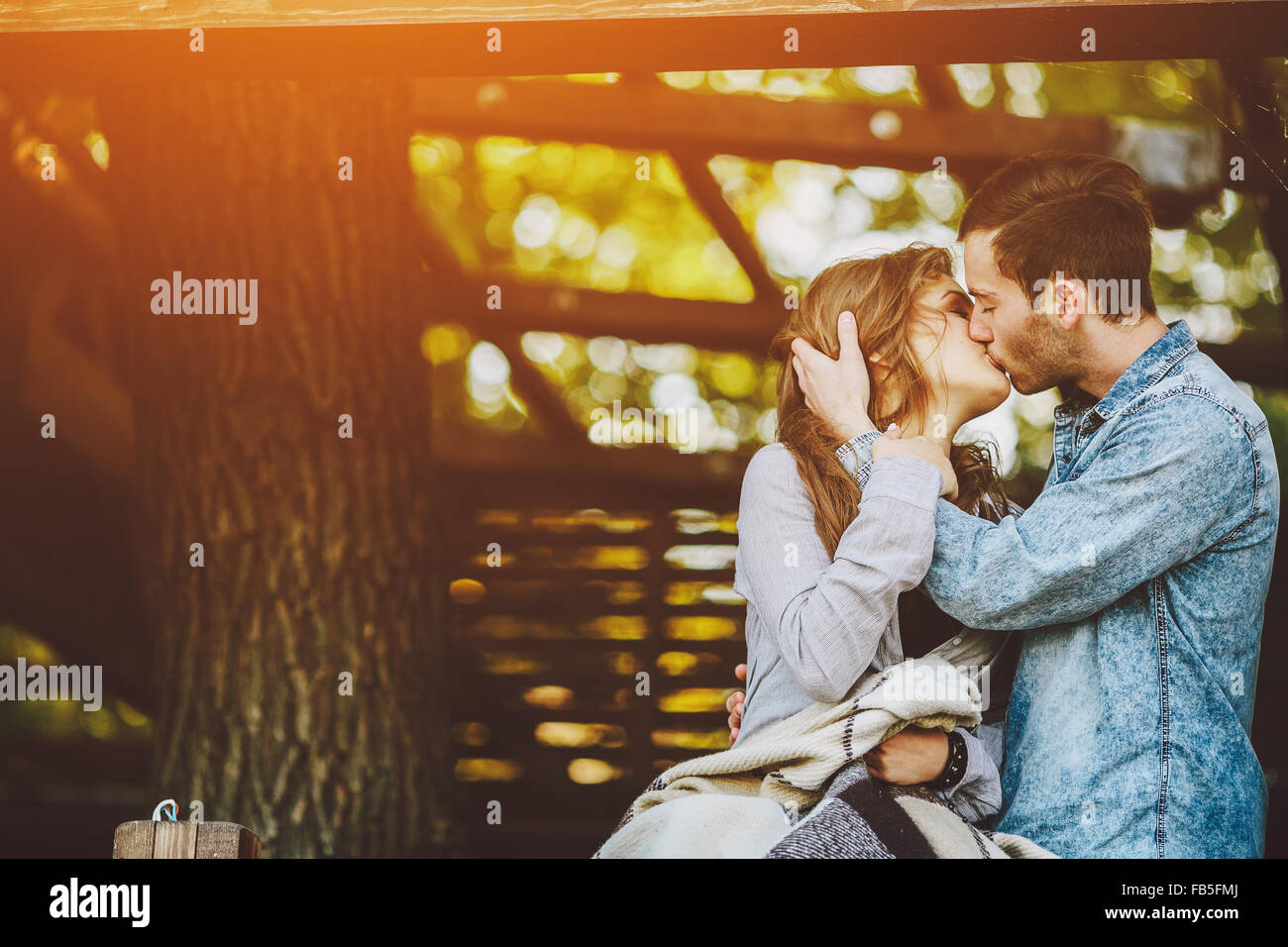 Young couple standing and embrace Stock Photo - Alamy