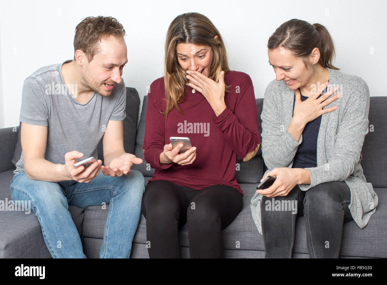 friends sharing a secret Stock Photo - Alamy