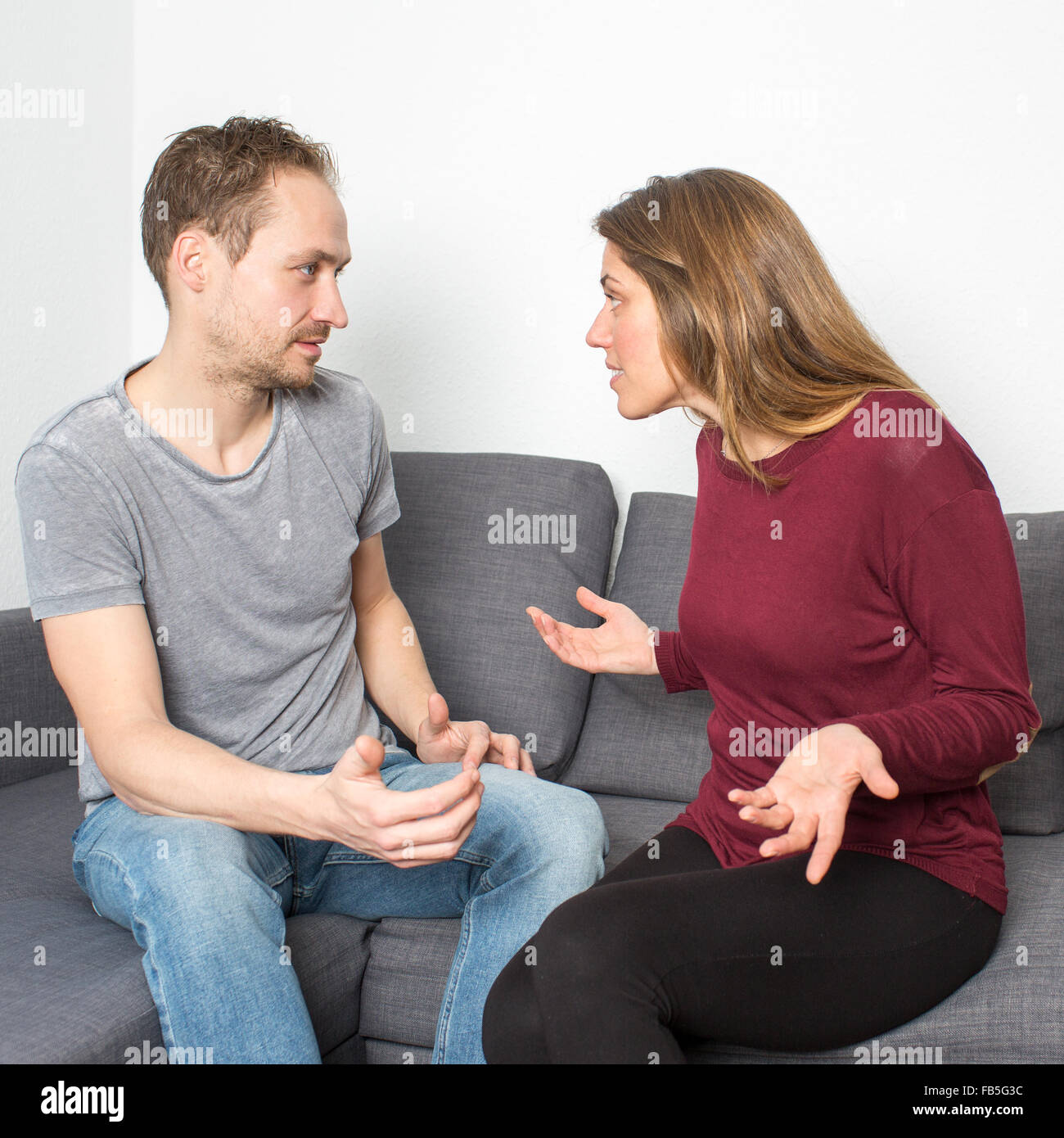 Couple having an argument Stock Photo - Alamy