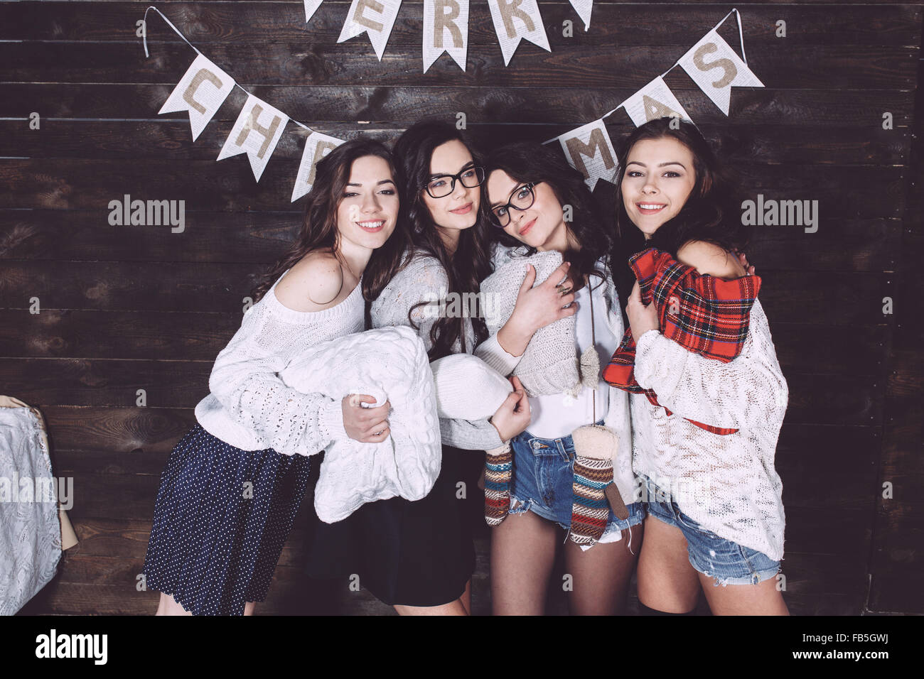 Cute girl hug and pose for the camera Stock Photo - Alamy