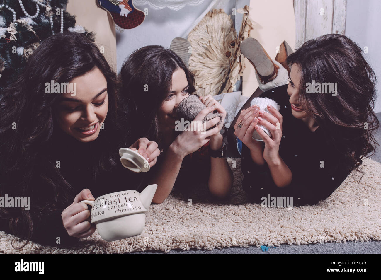 Beautiful girl eating Christmas cookies Stock Photo - Alamy