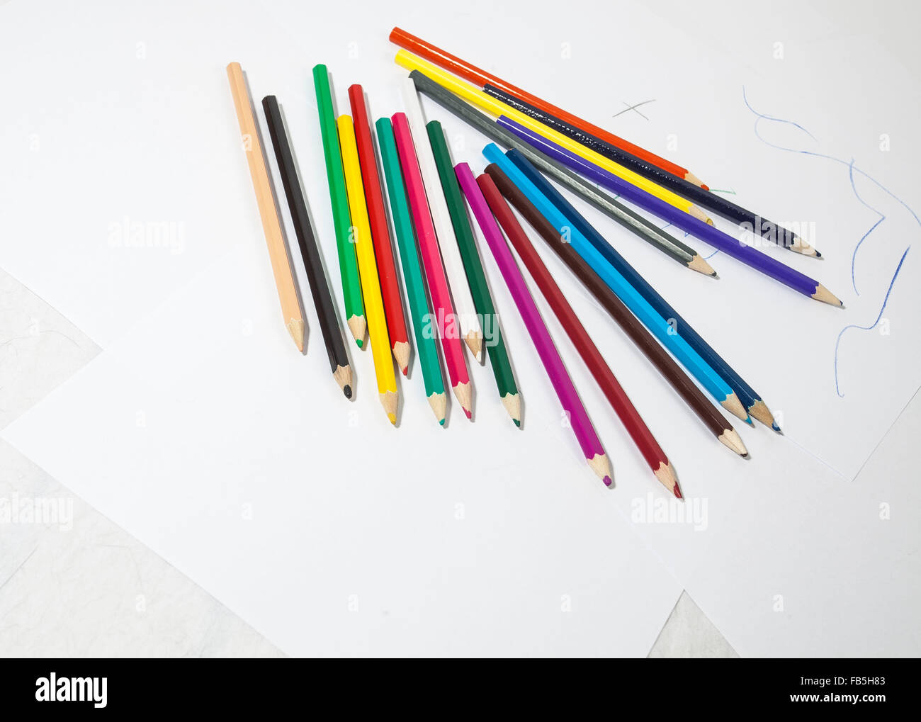 Postcard with colored pencils on paper as background Stock Photo - Alamy