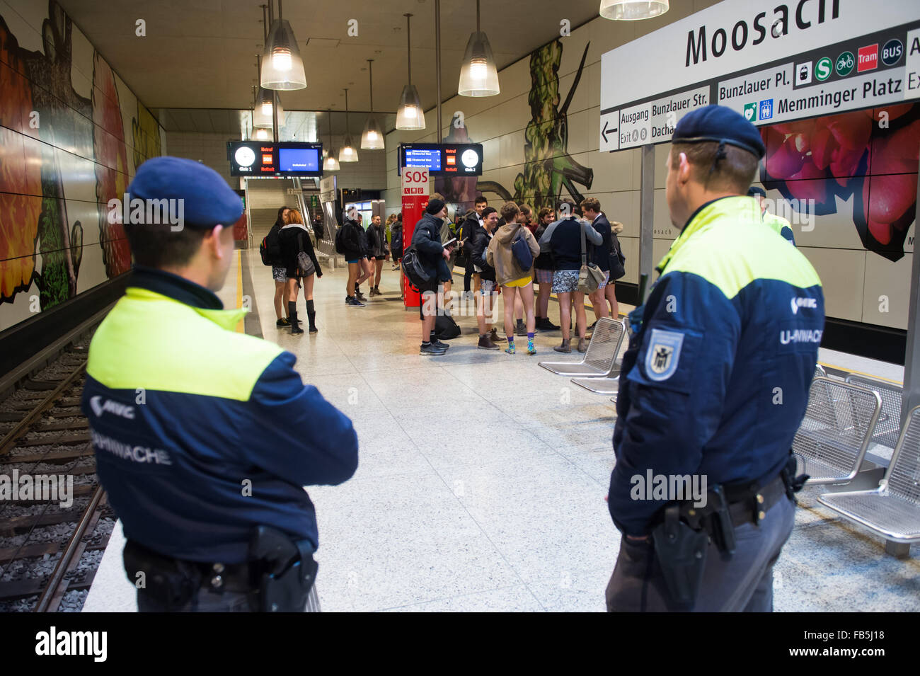 Munich, Germany. 10th Jan, 2016. Two underground security staff look at ...