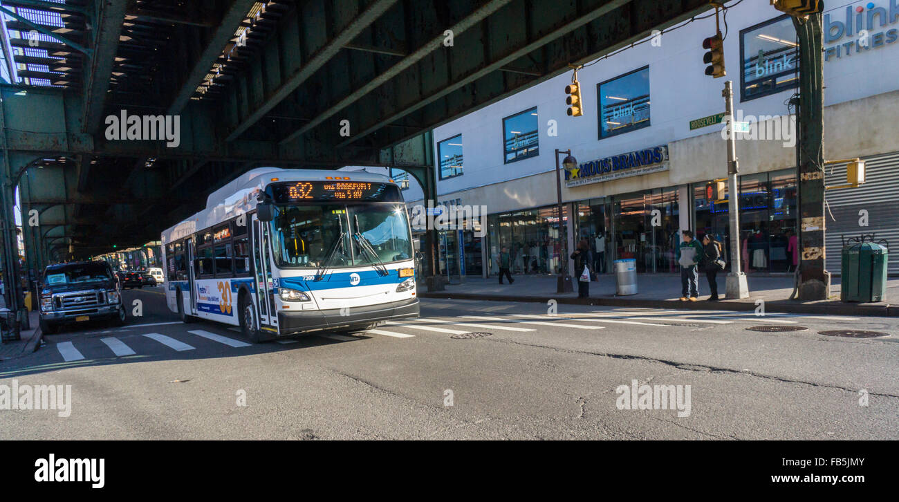 The Q32 bus under the elevated Number 7 train in the Jackson Heights ...