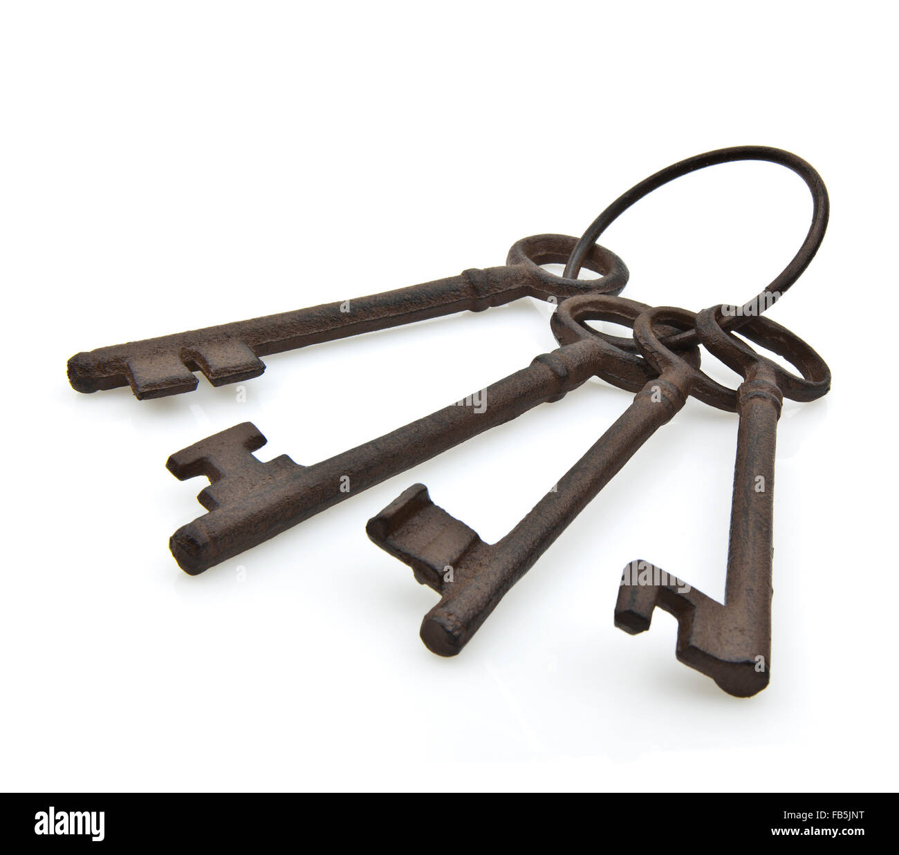 Set of old rusty antique keys over white background Stock Photo - Alamy