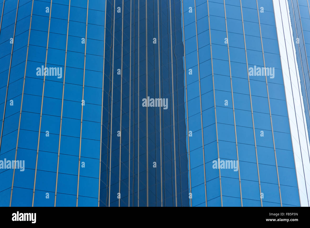 Blue glass skyscraper windows Stock Photo - Alamy