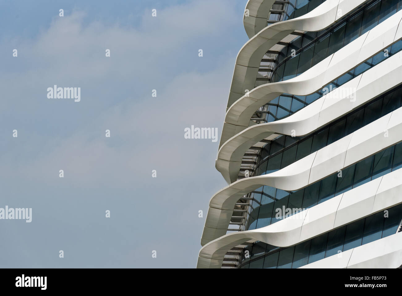 Futuristic skyscraper in a cruise ship design Stock Photo - Alamy