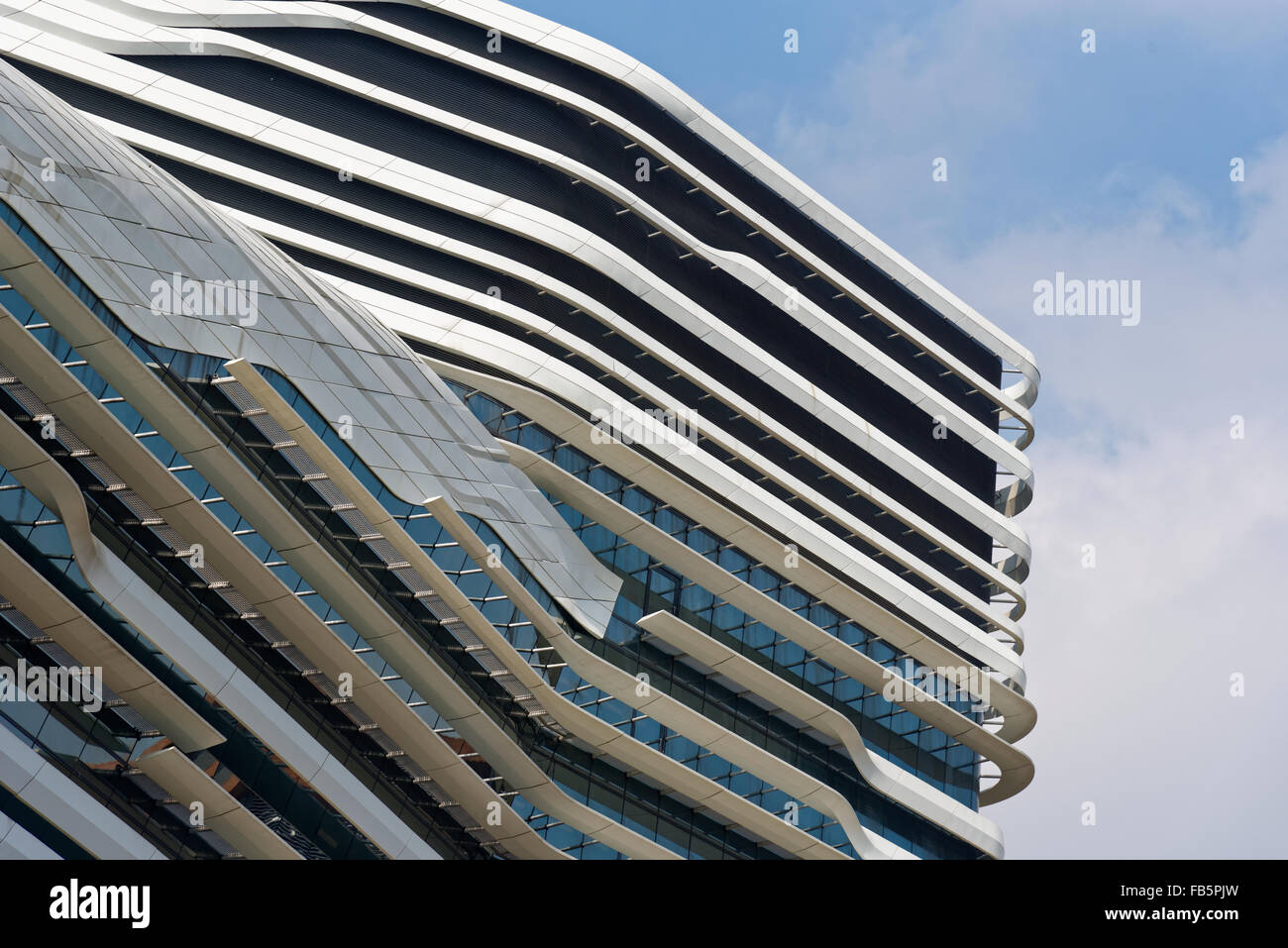Futuristic skyscraper in a cruise ship design Stock Photo - Alamy