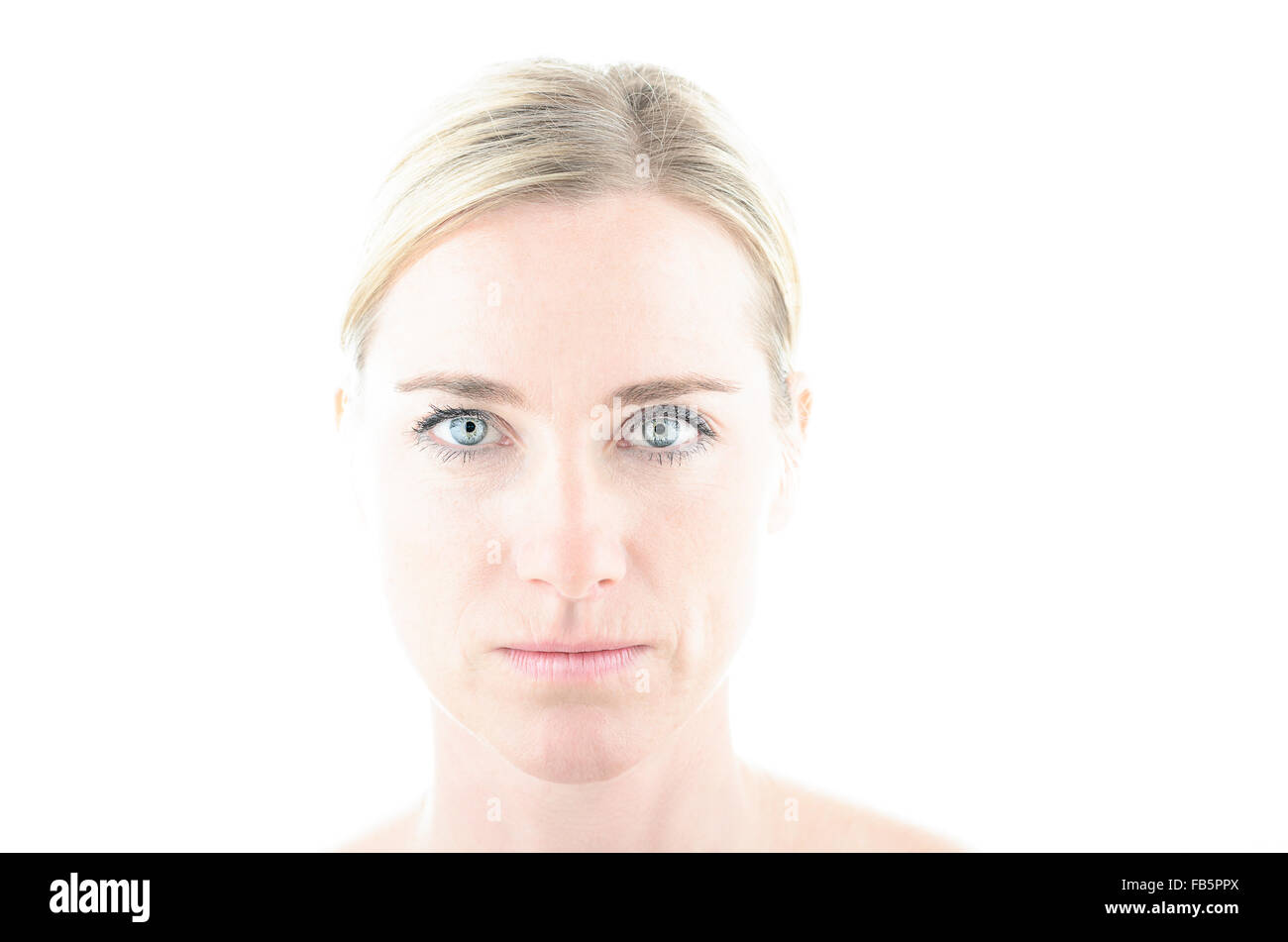 High Key Portrait of a blond woman against white background Stock Photo ...