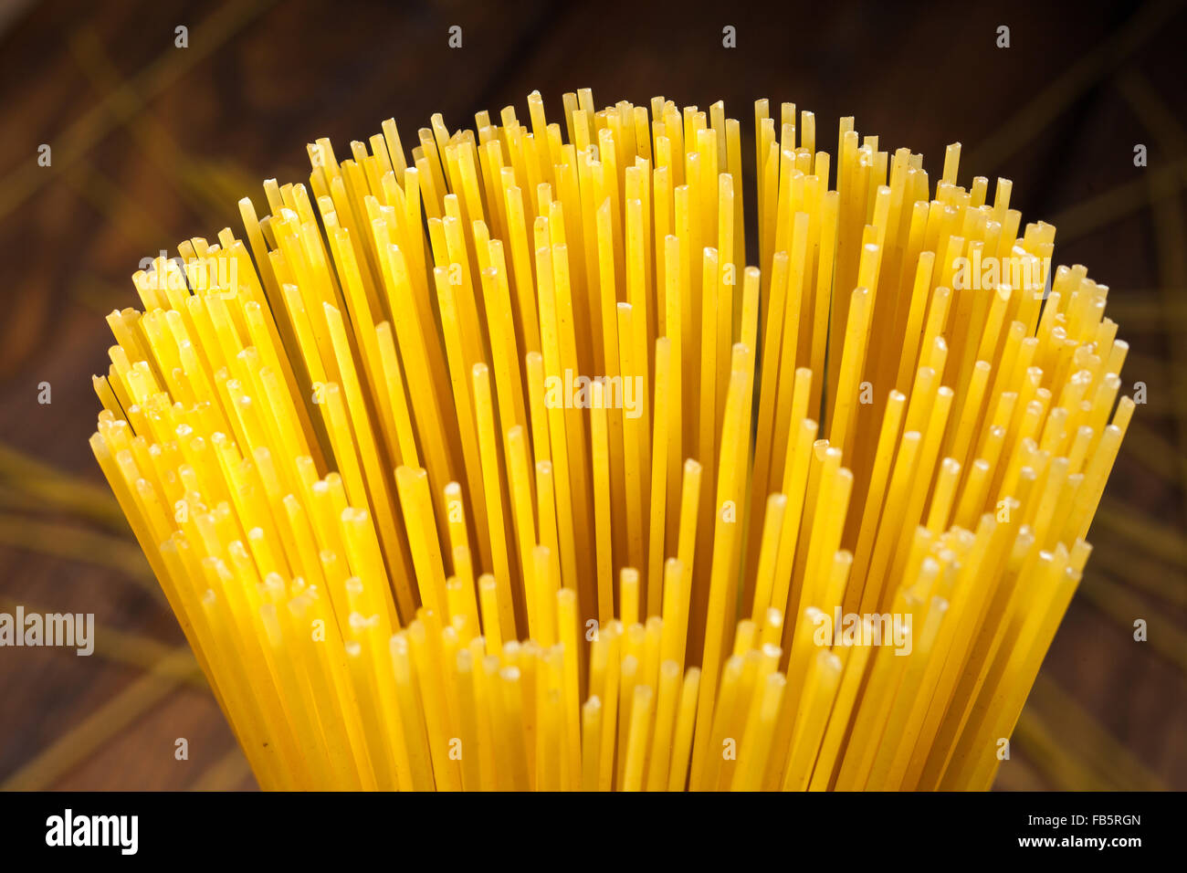 italian spaghetti on wooden background. Top view Stock Photo - Alamy