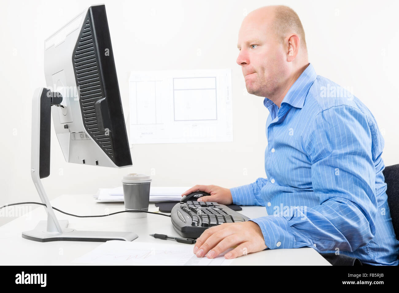 Focused businessman at the office Stock Photo - Alamy