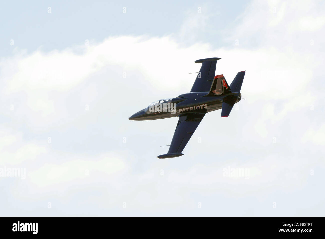 Jet fighter Patriots Flight Team airplane flying fast and low at 2015 ...