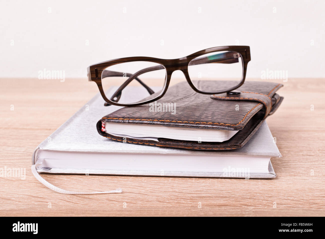 Modern eyeglasses placed on hi-res stock photography and images - Alamy