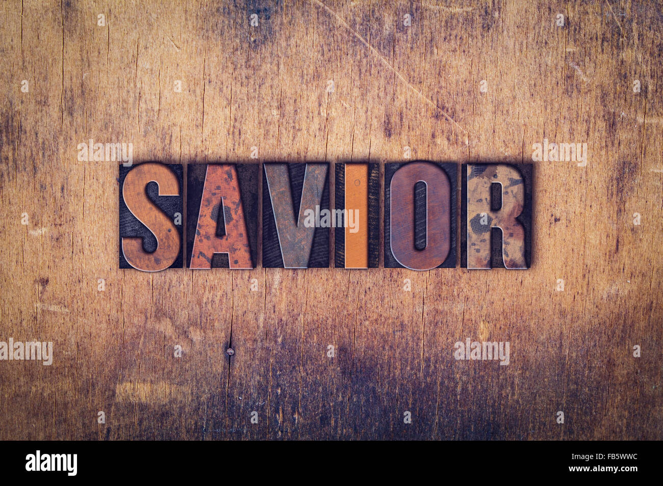 The word "Savior" written in dirty vintage letterpress type on a aged ...