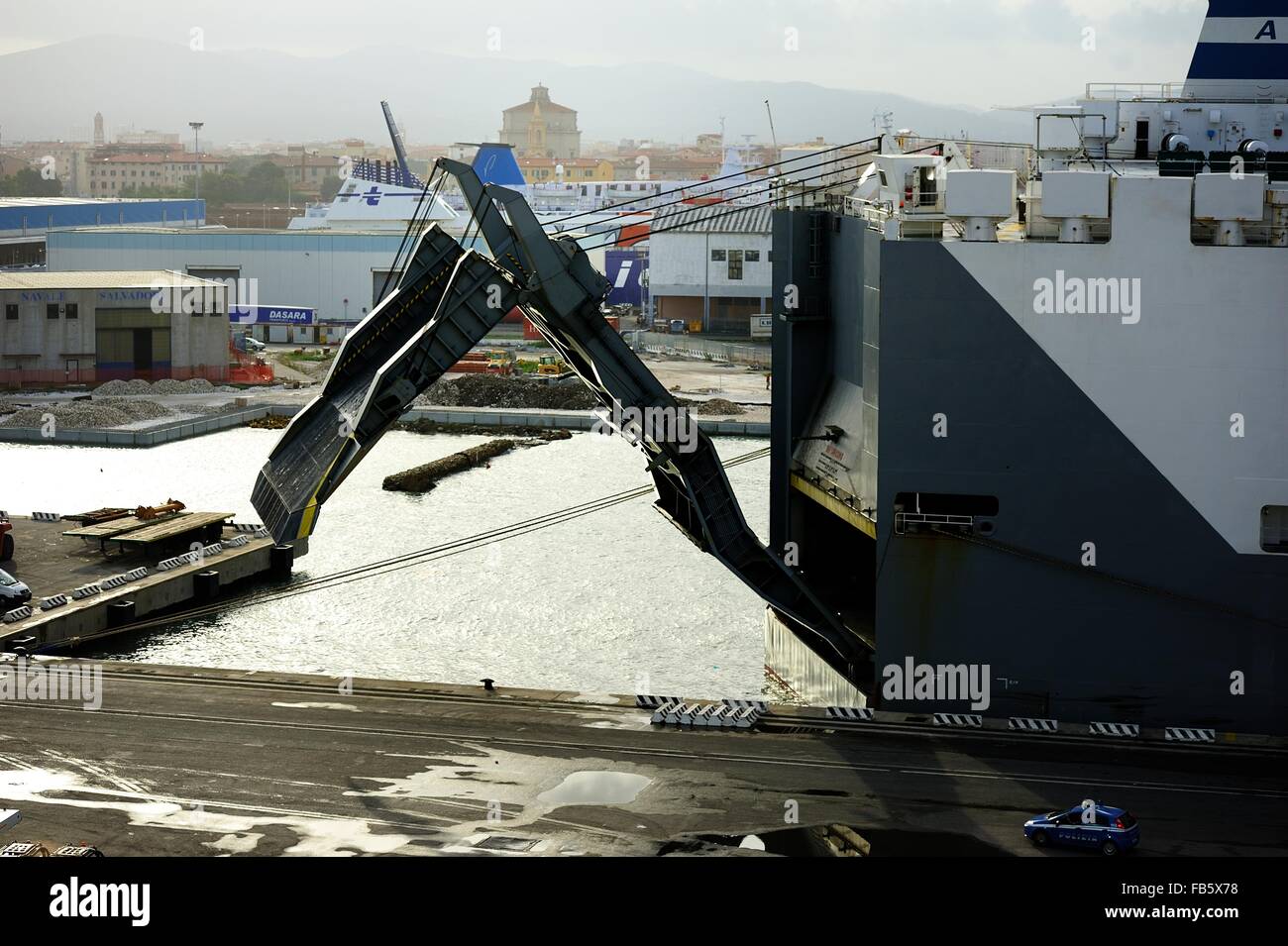Lowering the platform from the Cargo ship Stock Photo - Alamy
