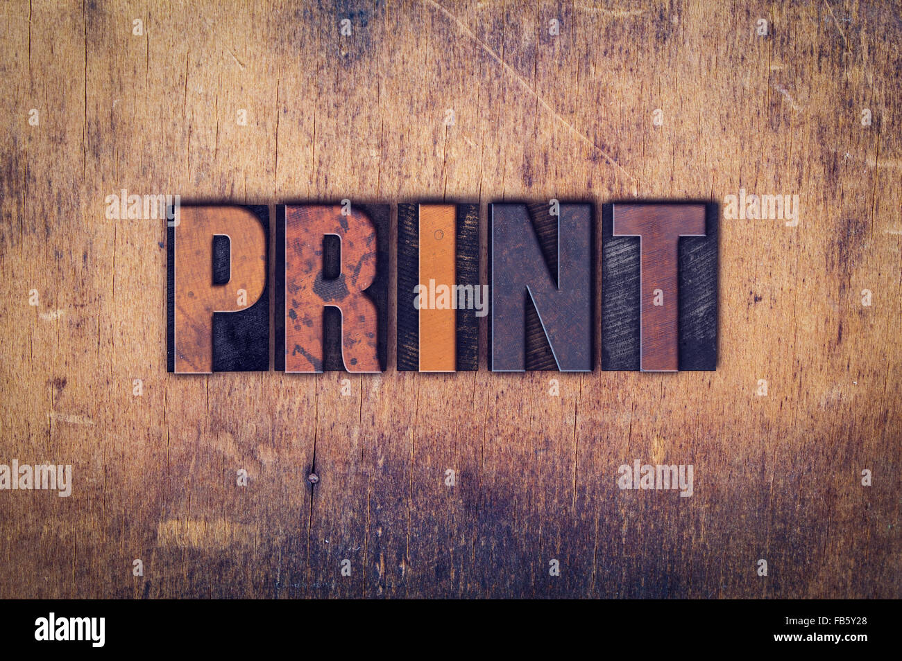 The word "Print" written in dirty vintage letterpress type on a aged ...