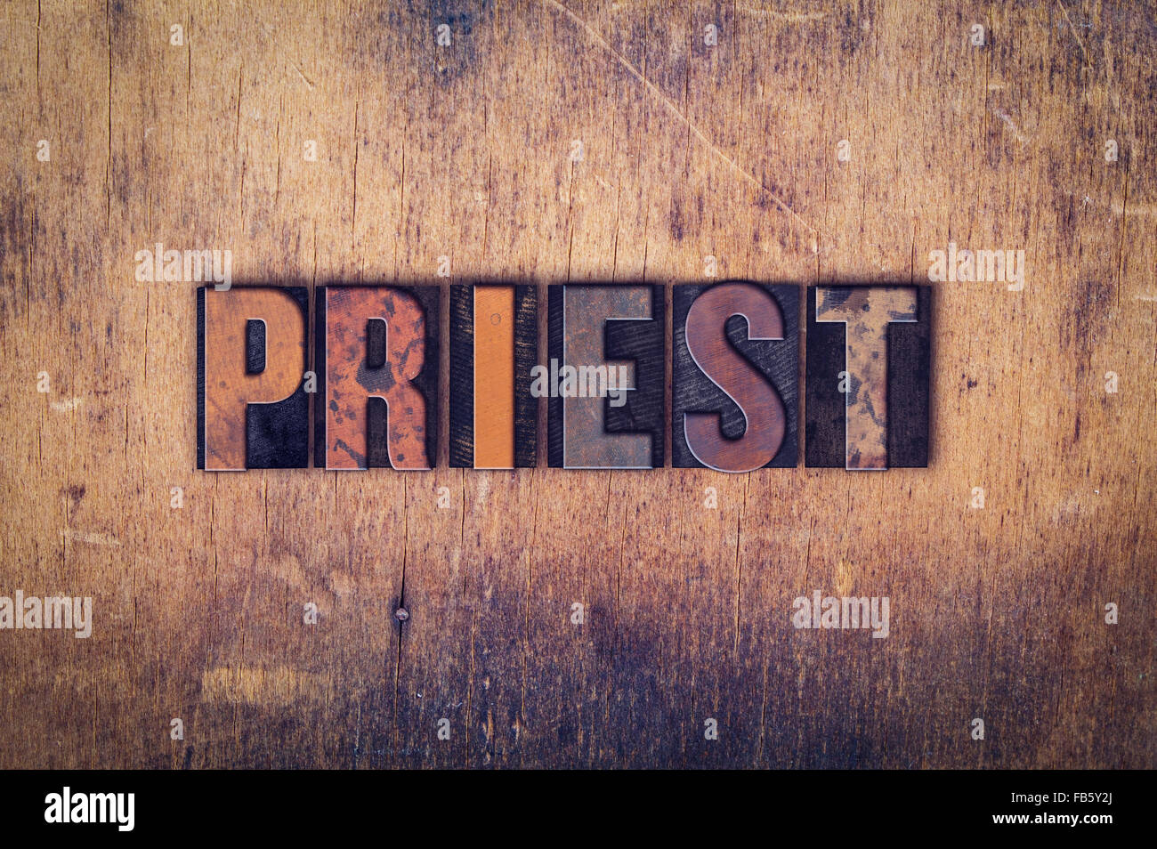The word "Priest" written in dirty vintage letterpress type on a aged ...
