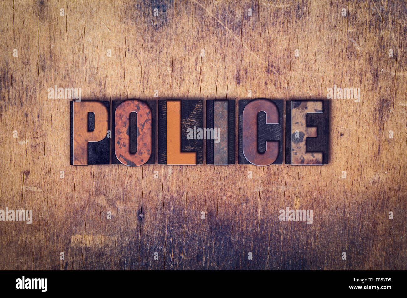 The word "Police" written in dirty vintage letterpress type on a aged ...