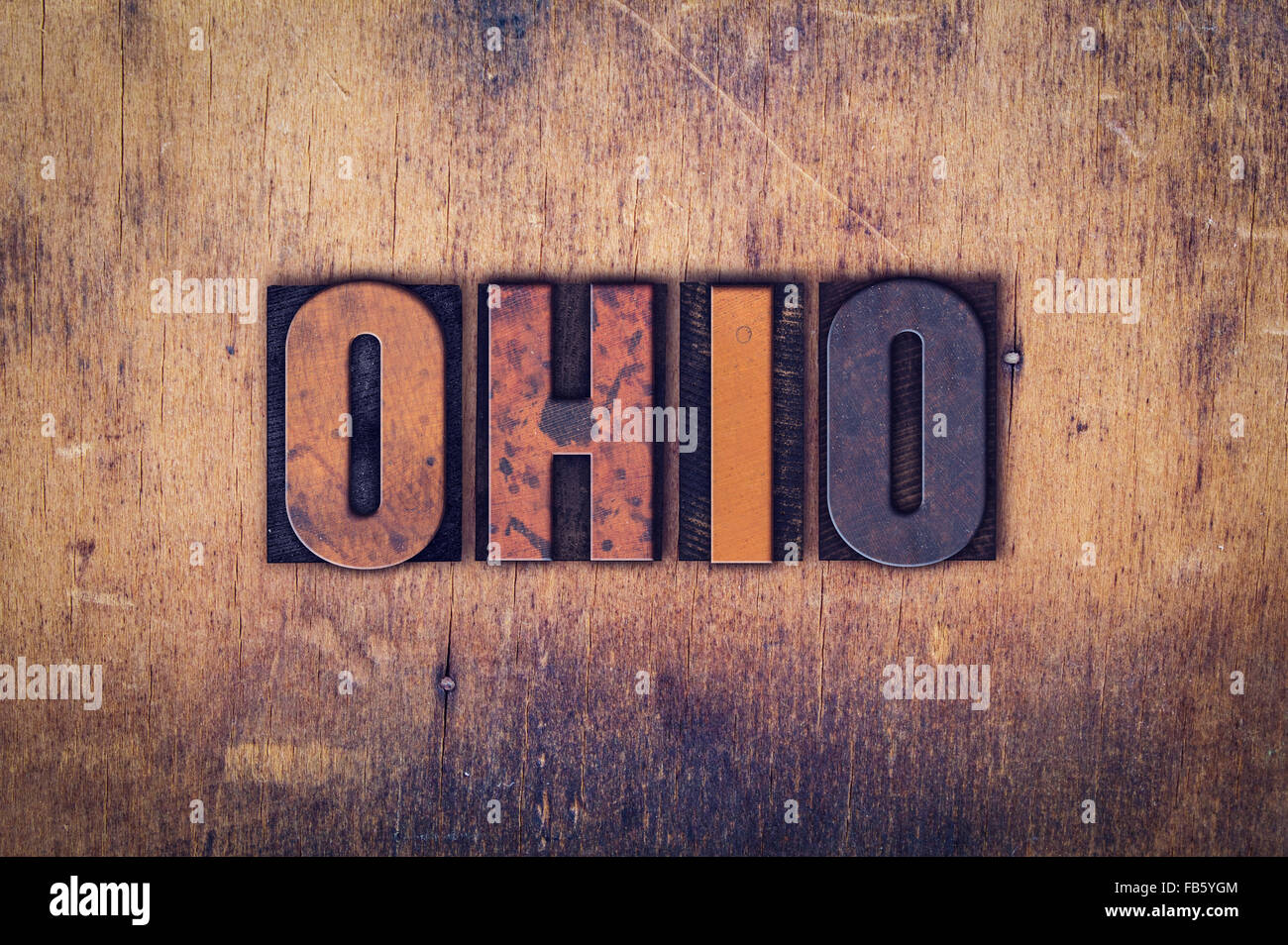 The word "Ohio" written in dirty vintage letterpress type on a aged ...