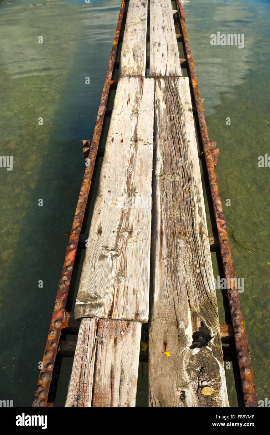 improvised bridge at small local port Stock Photo - Alamy