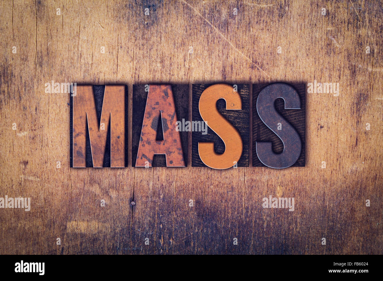 The word "Mass" written in dirty vintage letterpress type on a aged ...