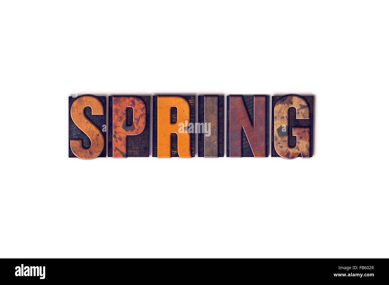 The word "Spring" written in isolated vintage wooden letterpress type ...