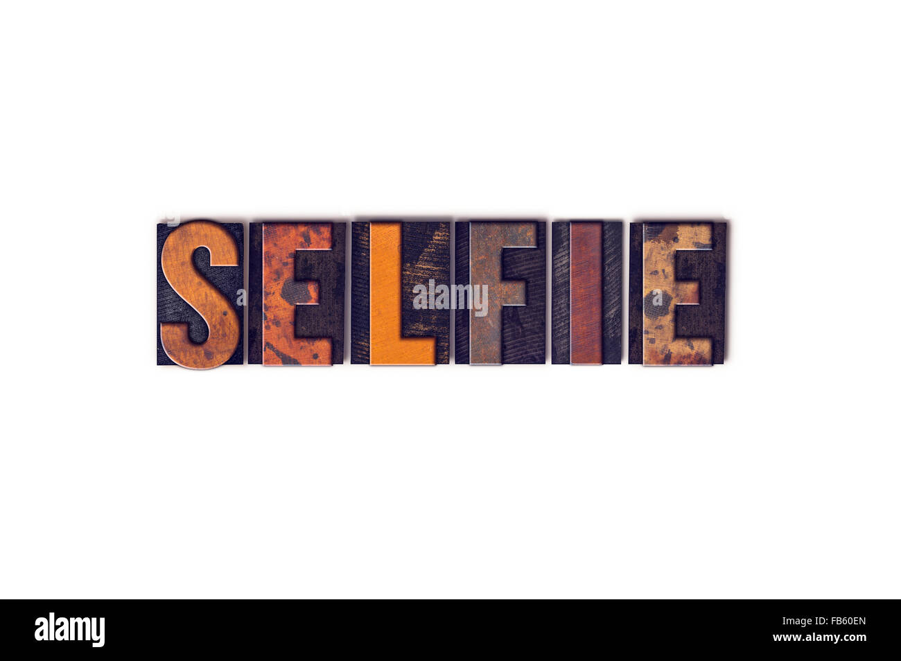 The word "Selfie" written in isolated vintage wooden letterpress type ...
