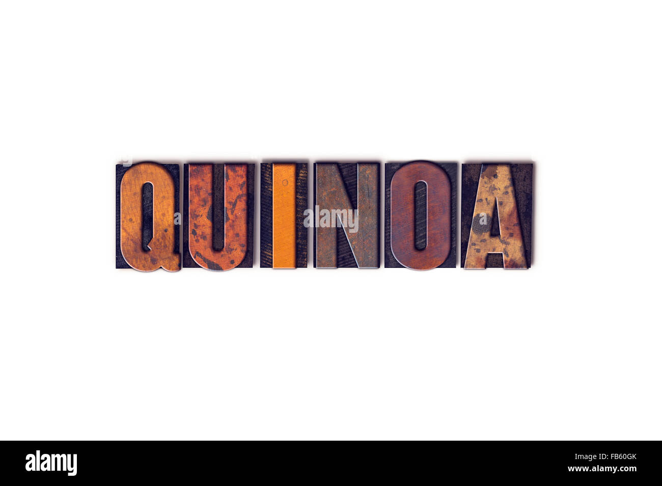 The word "Quinoa" written in isolated vintage wooden letterpress type ...