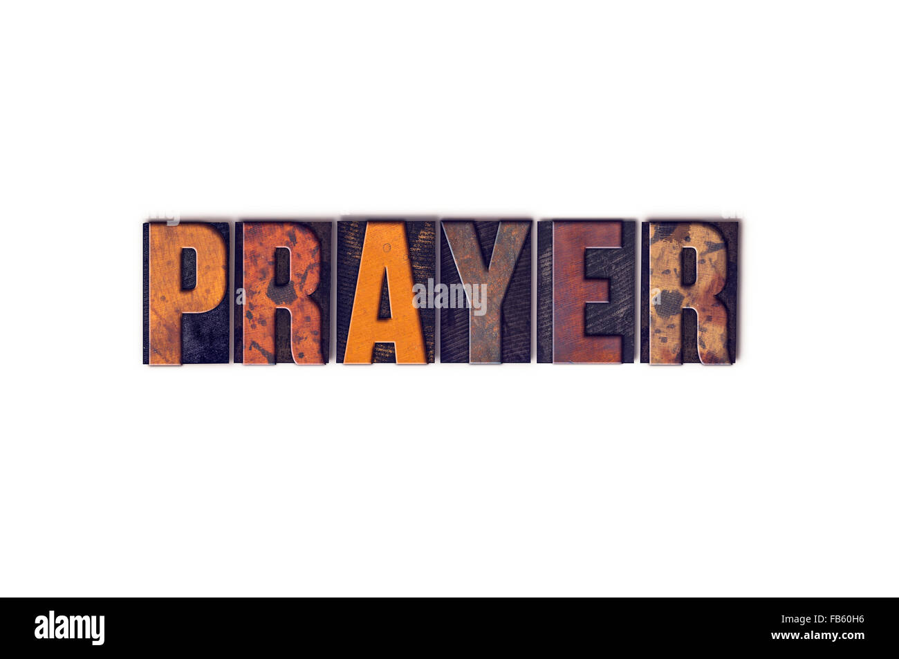 The word "Prayer" written in isolated vintage wooden letterpress type ...