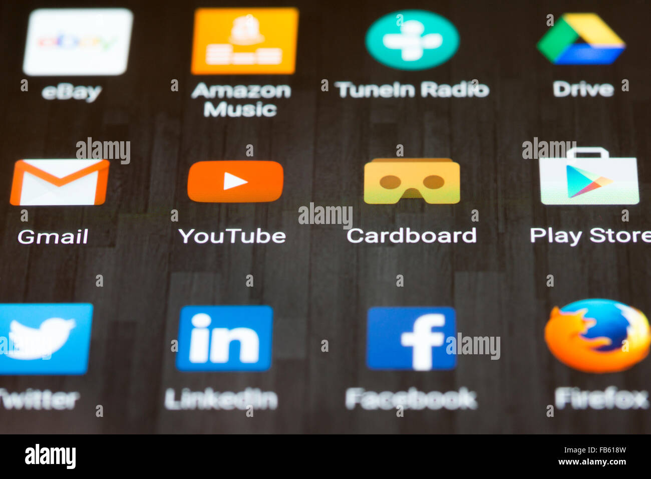 A closeup of a mobile phone screen showing common apps Stock Photo - Alamy