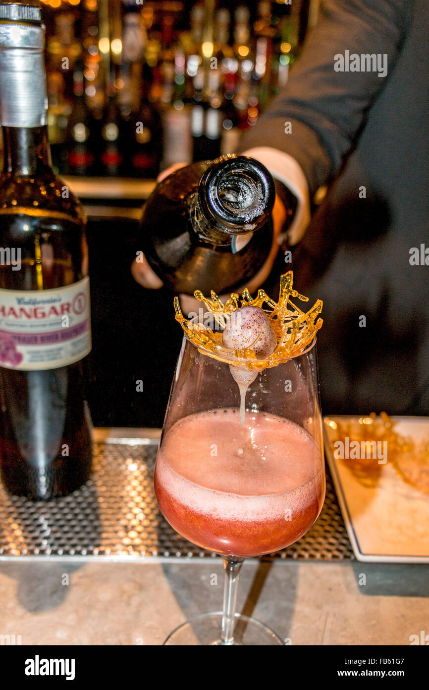 Mixologist creates a Billini Rosso, a fancy alcoholic drink Stock Photo ...