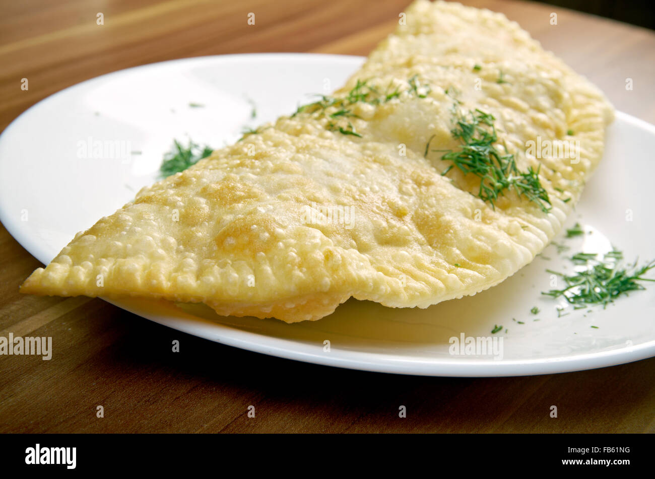 Cheburek with meat- traditional Caucasian dish.national dish of the ...