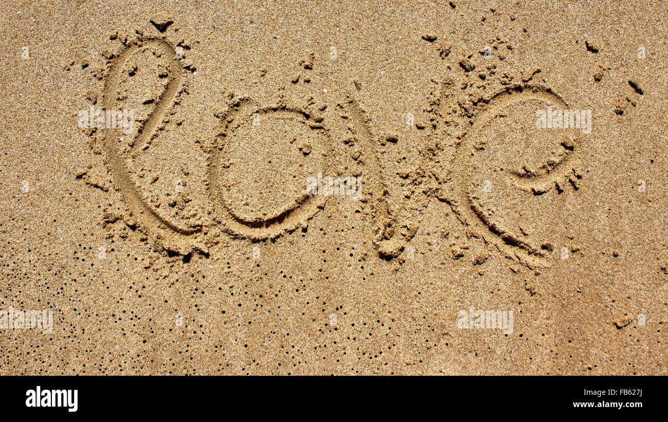 love message written in sand at beach Stock Photo - Alamy