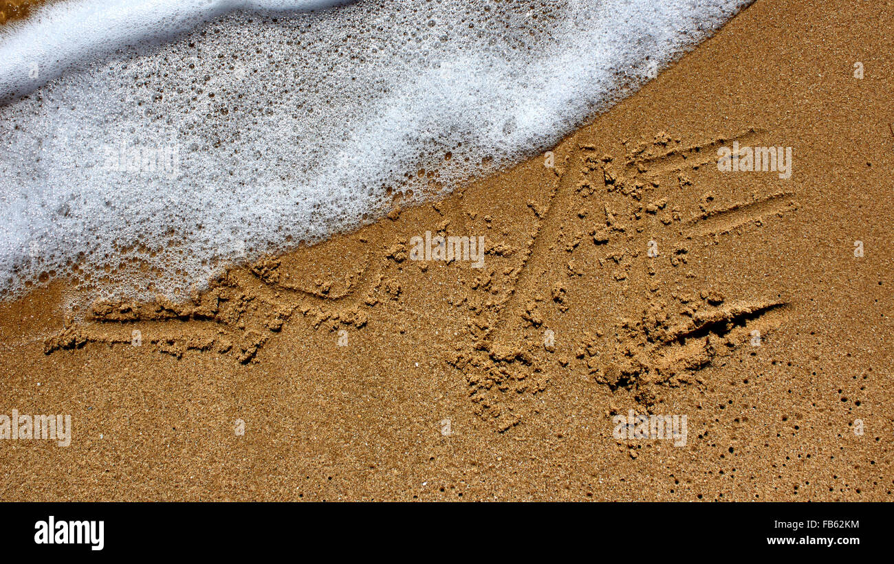 love message written in sand at beach Stock Photo - Alamy