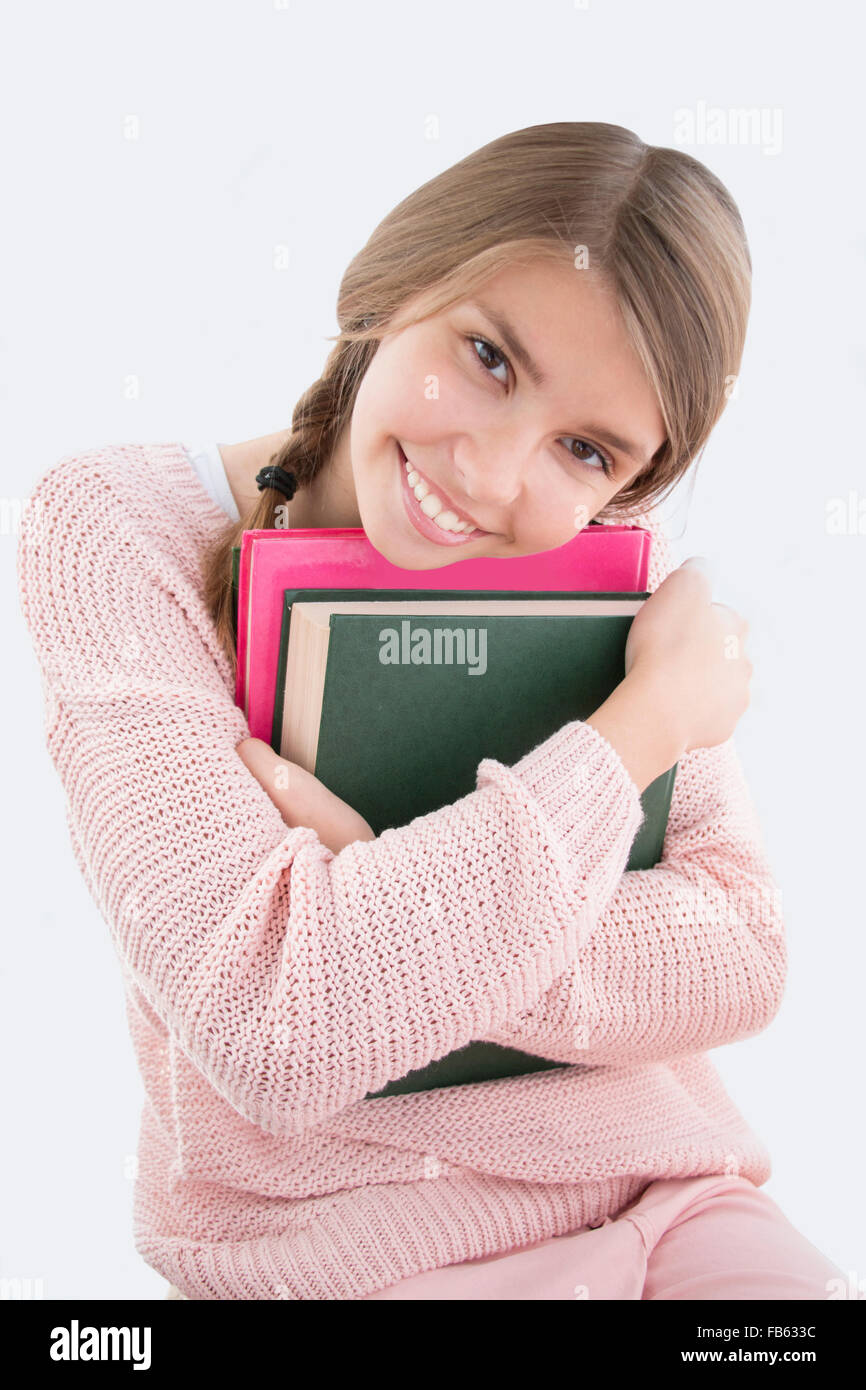 Teenage girl with books Stock Photo - Alamy