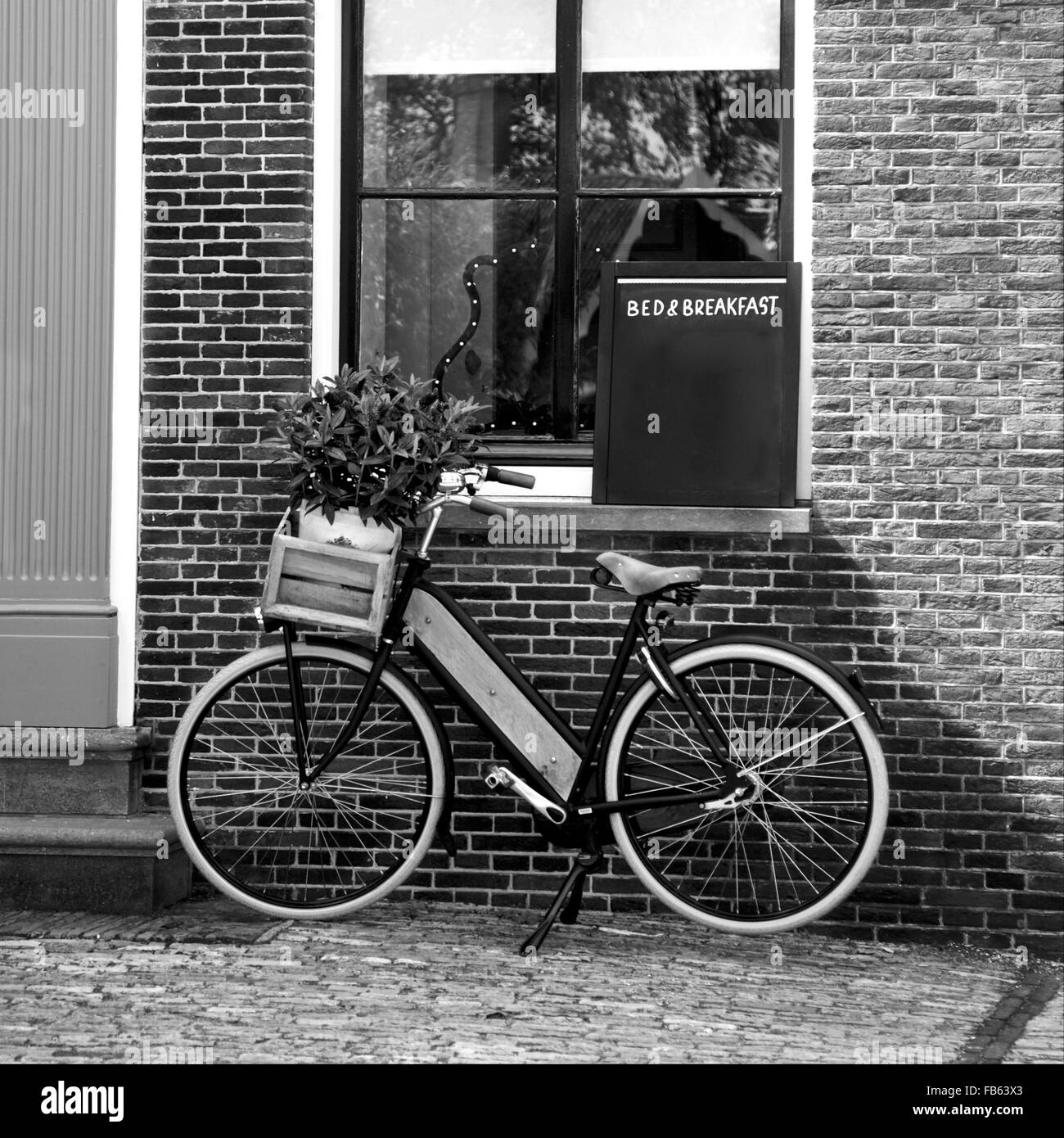 Flowers in front wall Black and White Stock Photos & Images - Alamy