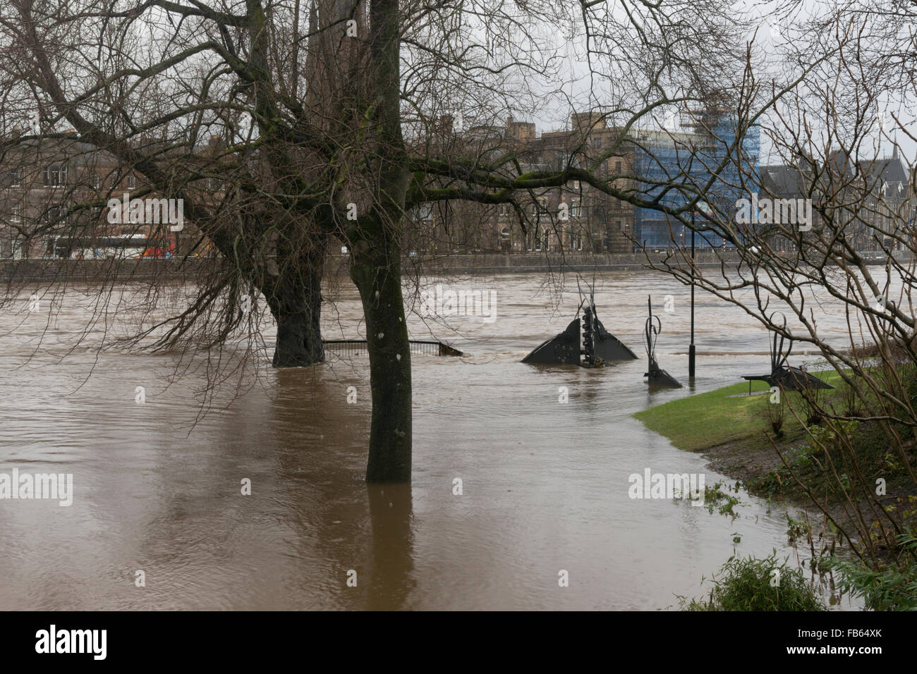 River Tay flooding in Norrie Miller Walkway, with submerged sculpture ...