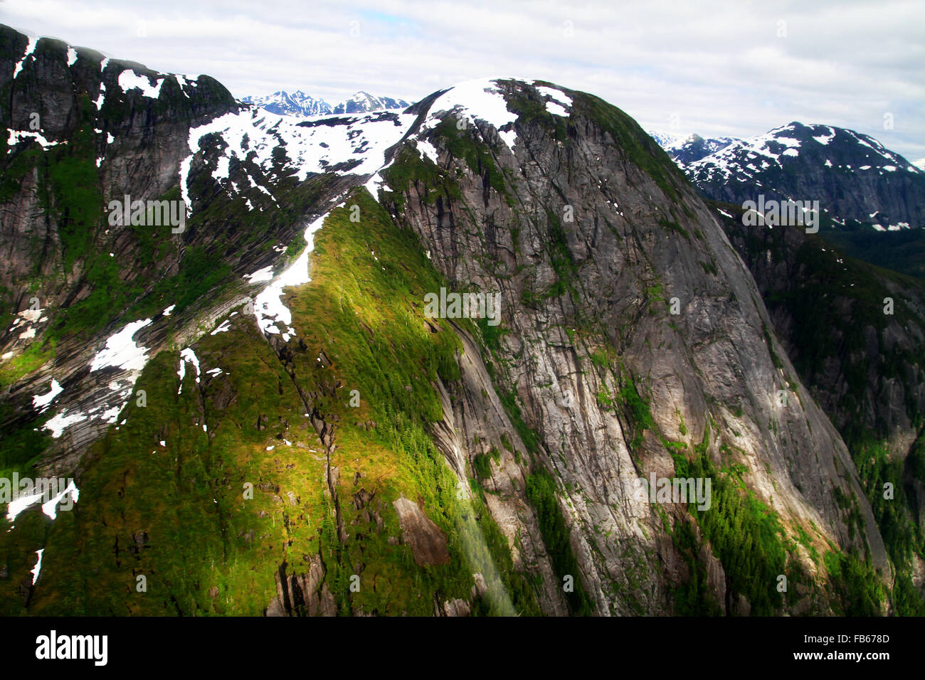 Aerial scenery during a sightseeing flight of mountains in the ...