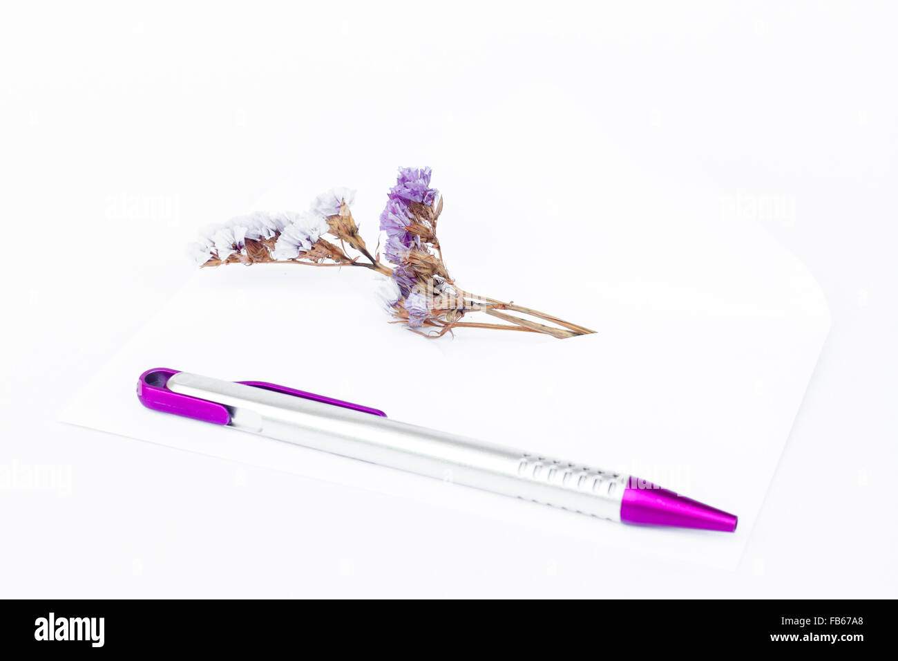 Envelope with pen isolated on white background, stock photo Stock Photo ...