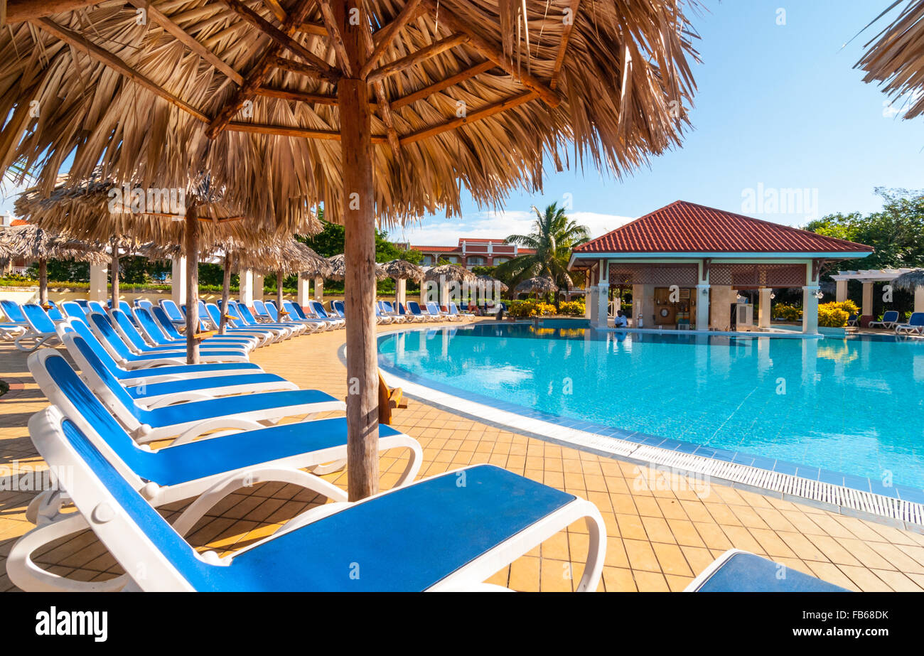 Beautiful blue sky holiday resort pool side view. Getaway vacation in ...