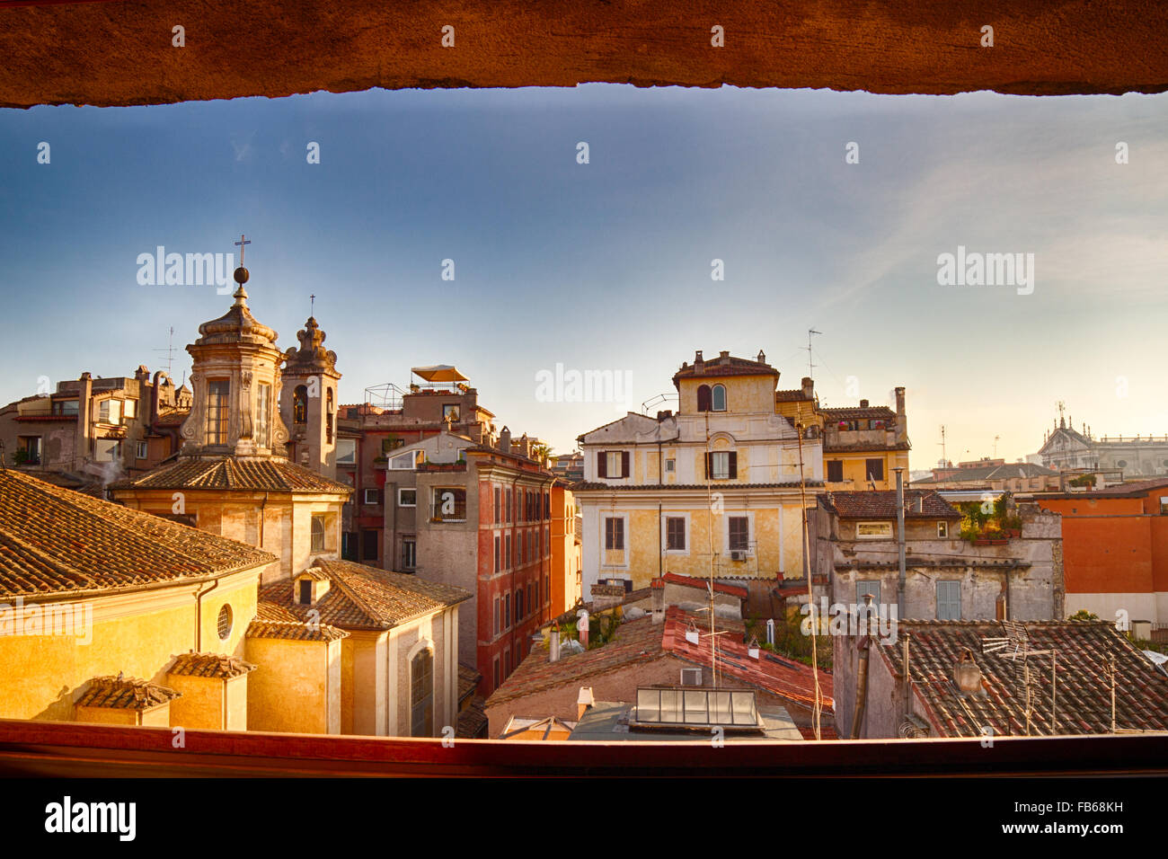 overlooking the rooftops of Rome, historic palaces, Catholic churches ...